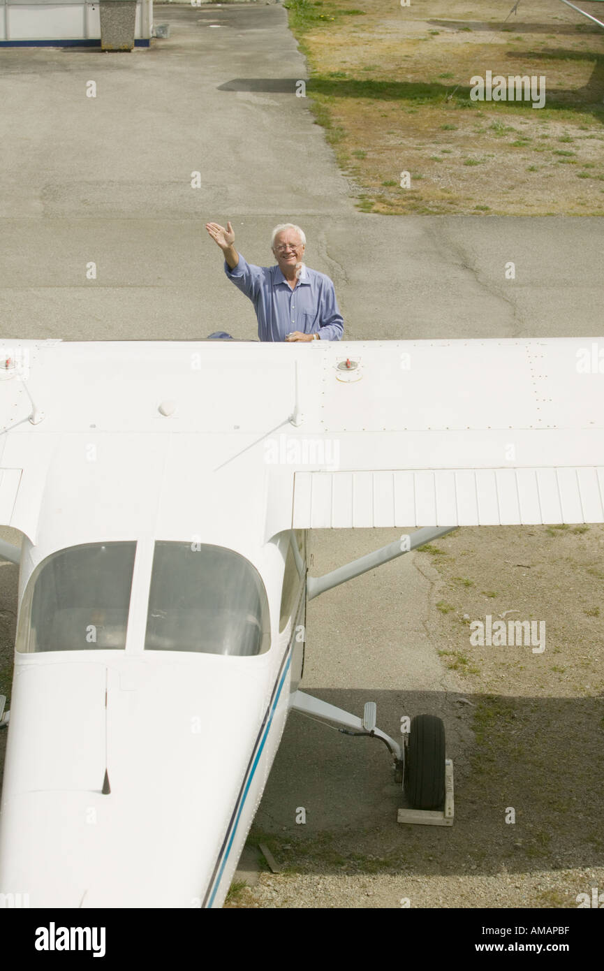 Senior caucasian male with Cessna aircraft Stock Photo - Alamy