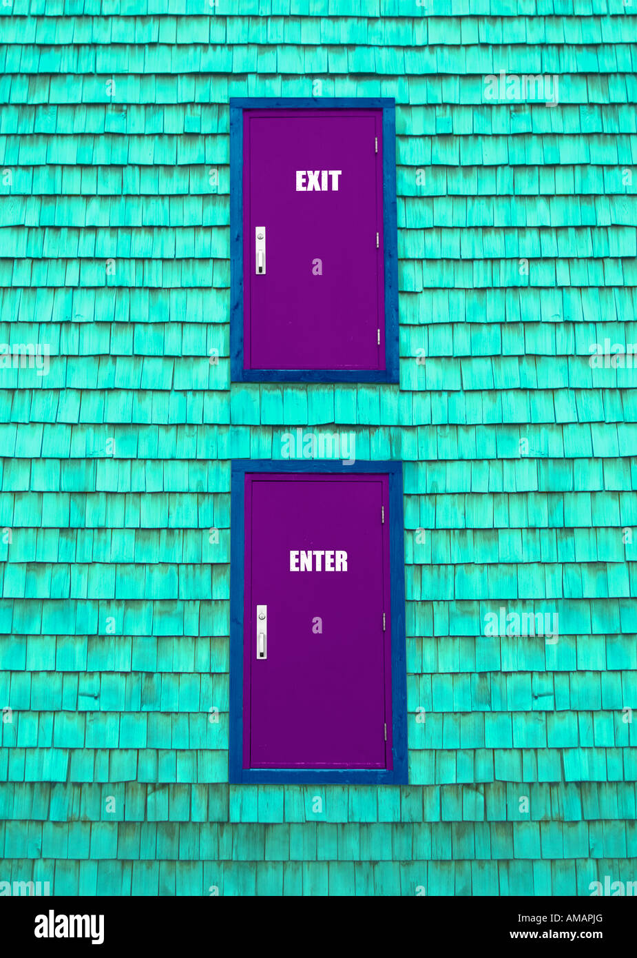 Enter and exit doors on side of building Stock Photo - Alamy