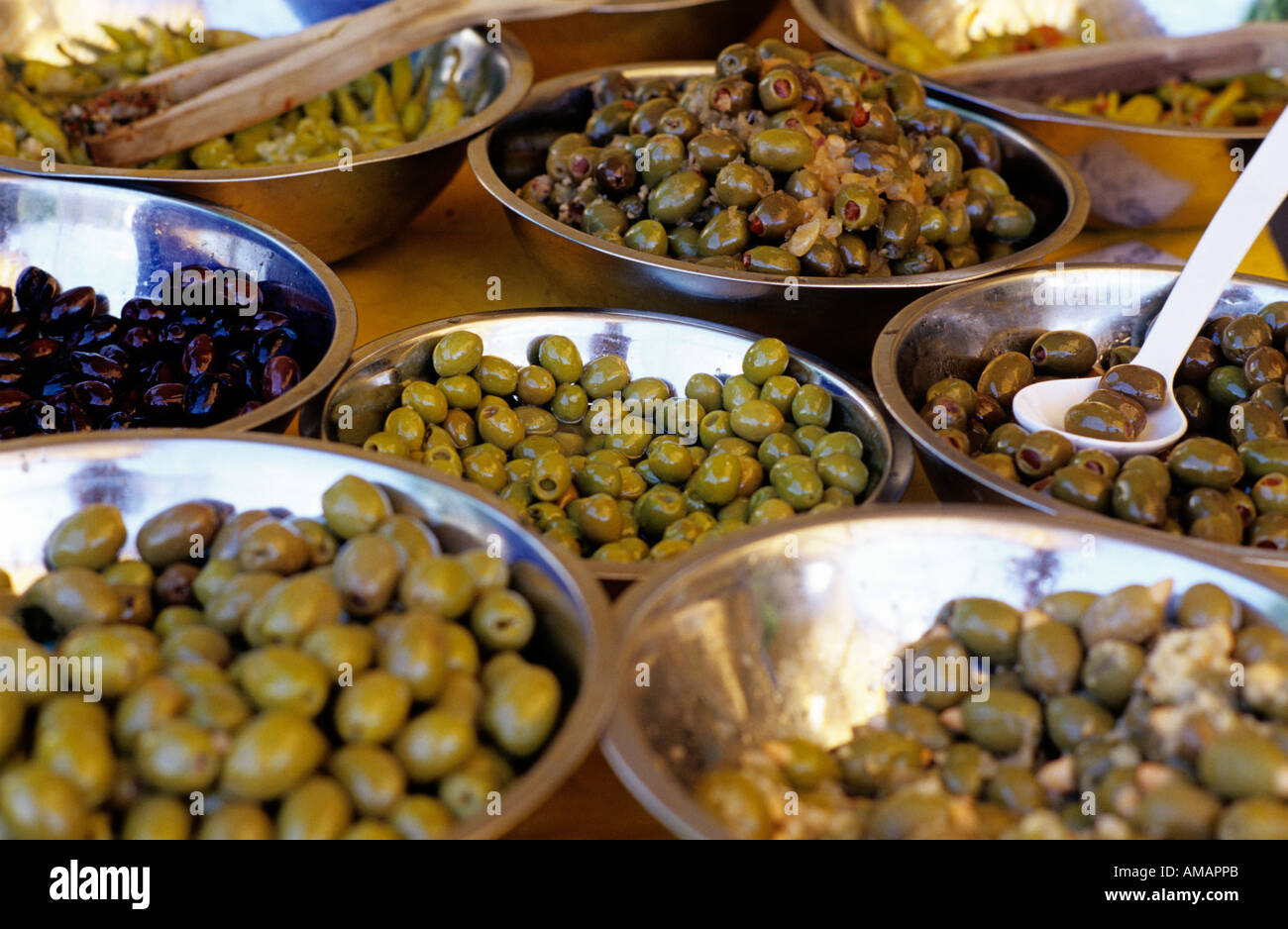 Various olives in bowls, elevated view, close-up Stock Photo - Alamy