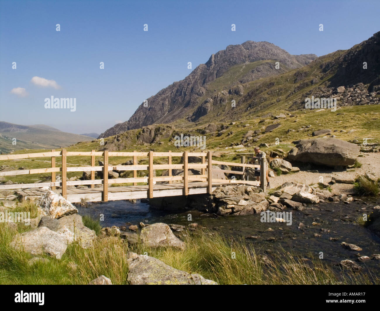 WOODEN FOOTBRIDGE over STREAM from Llyn Idwal in Cwm Idwal National ...