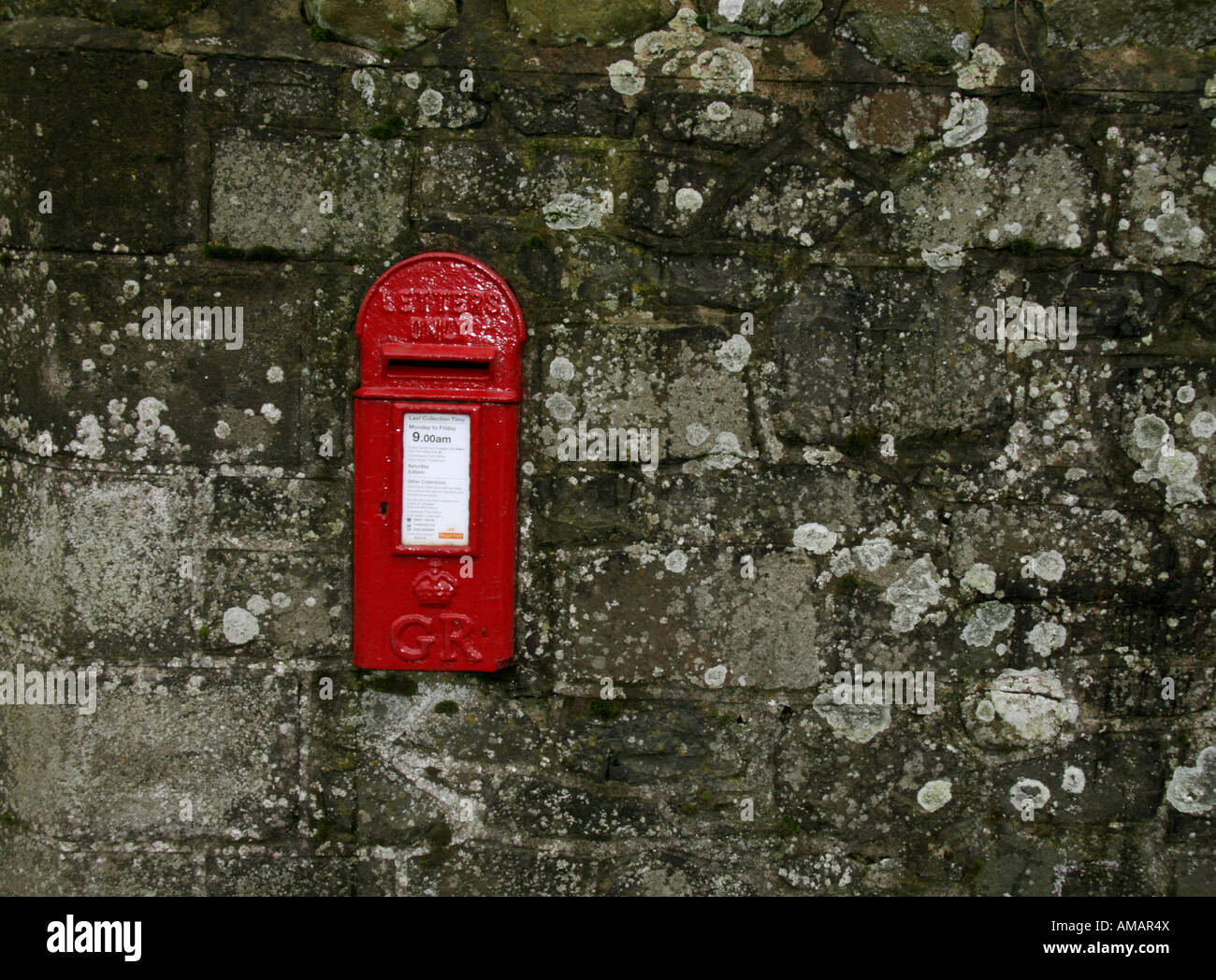 Red Post, Box in Wall surounded by Lichens Stock Photo - Alamy