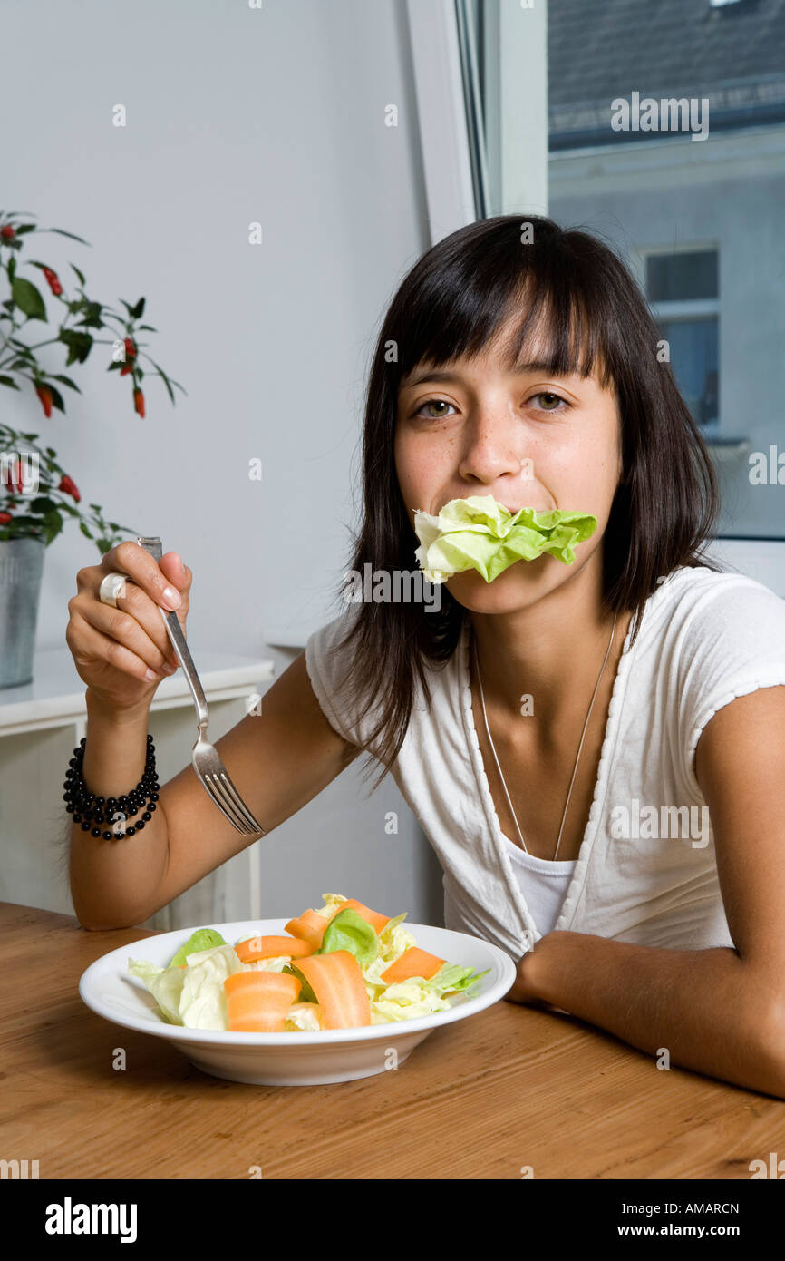 One woman sitting table hi-res stock photography and images - Alamy