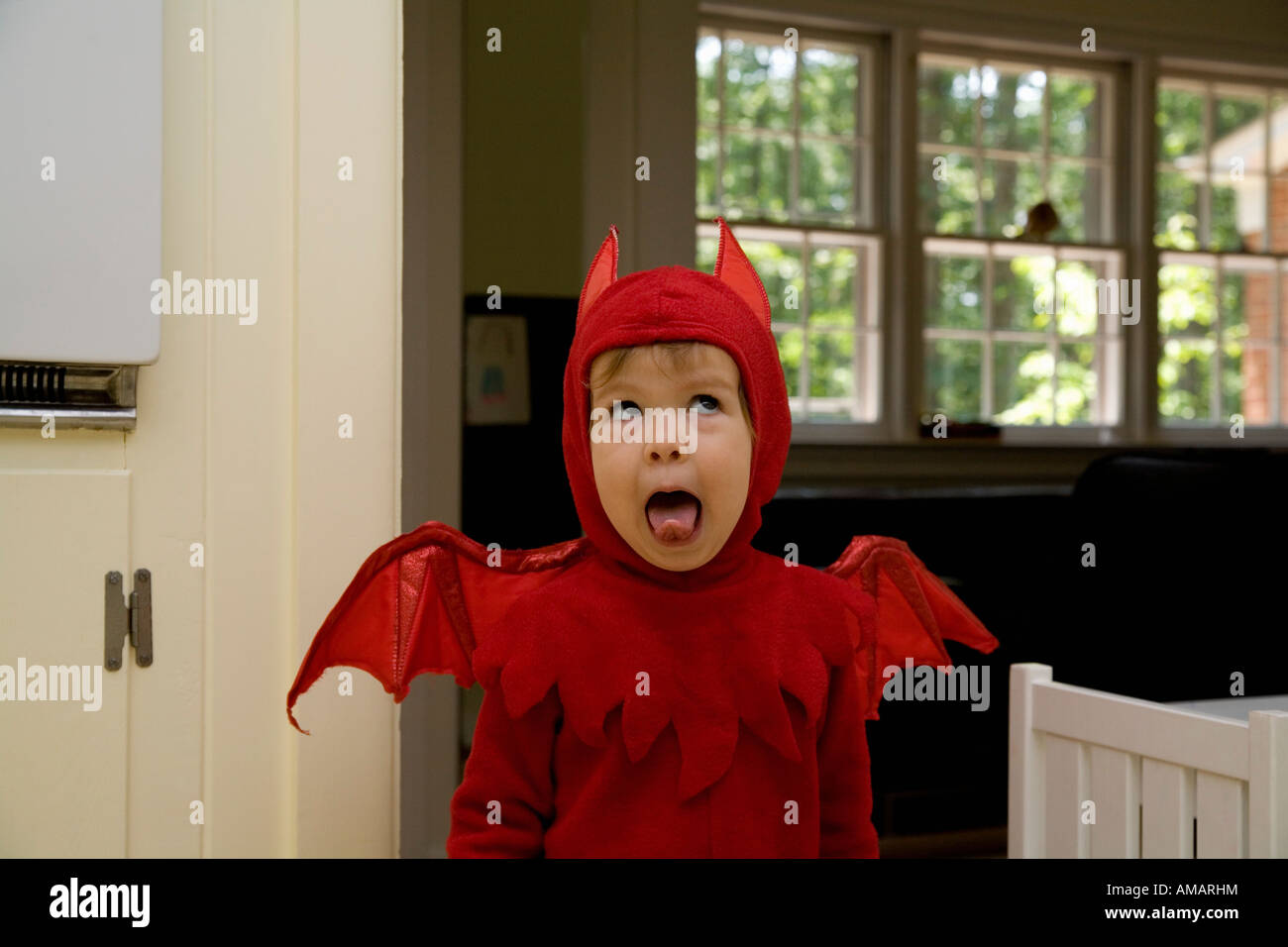A child dressed as a devil Stock Photo - Alamy