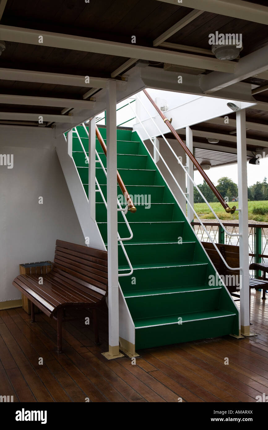 Steps on a boat leading to the deck above Stock Photo - Alamy