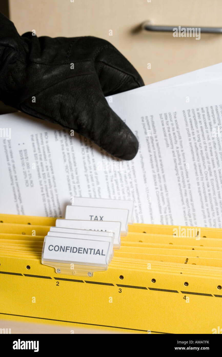 A gloved hand taking documents Stock Photo - Alamy