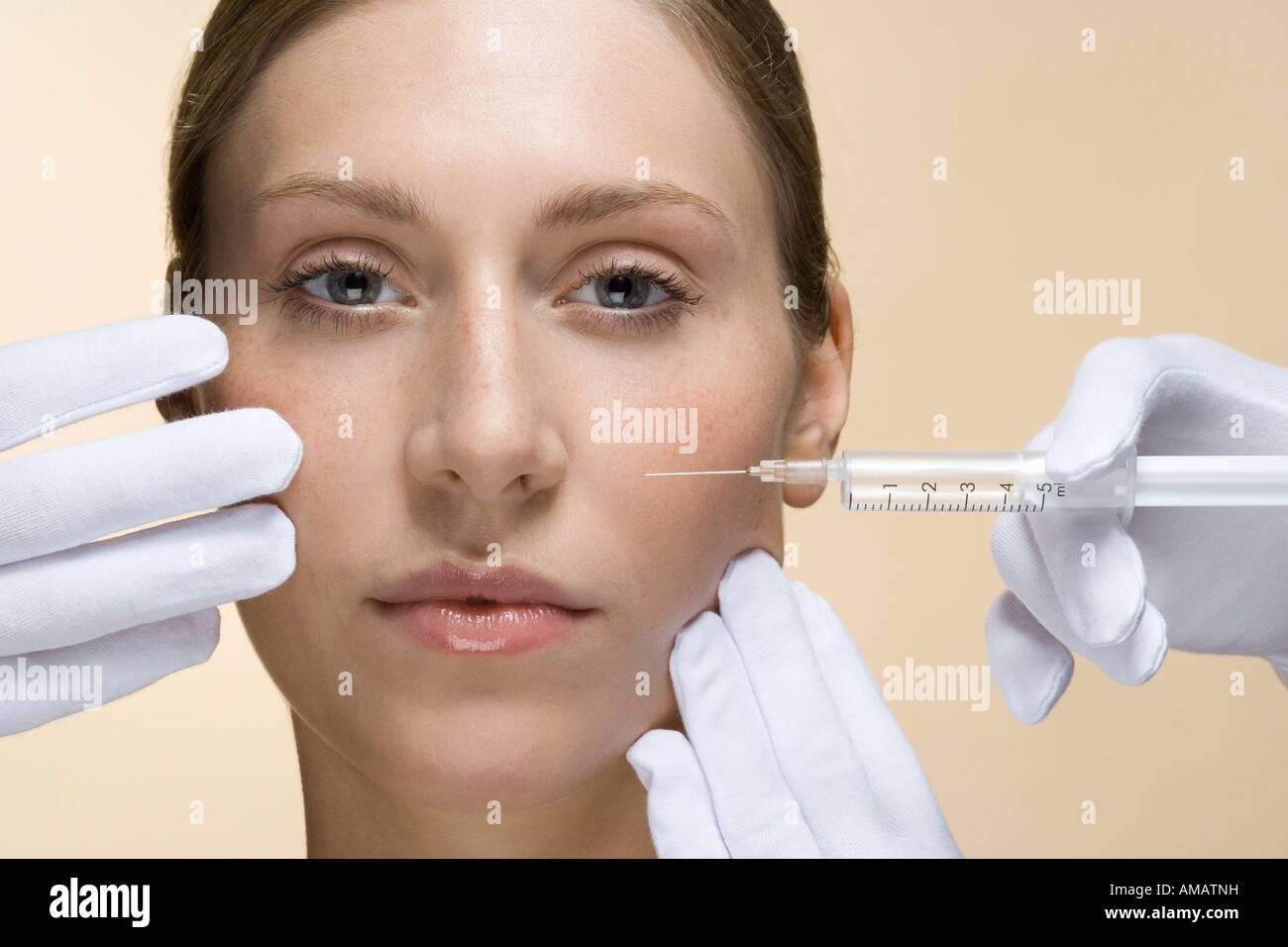 A woman having a collagen injection Stock Photo - Alamy