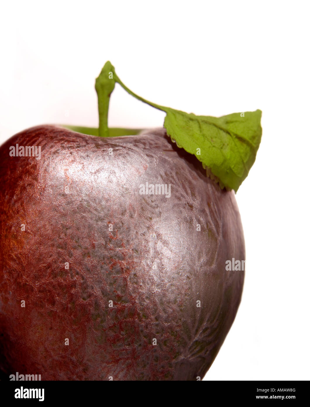 Studio Shot Of Bronze-Colored Painted Apple On White Background Stock ...