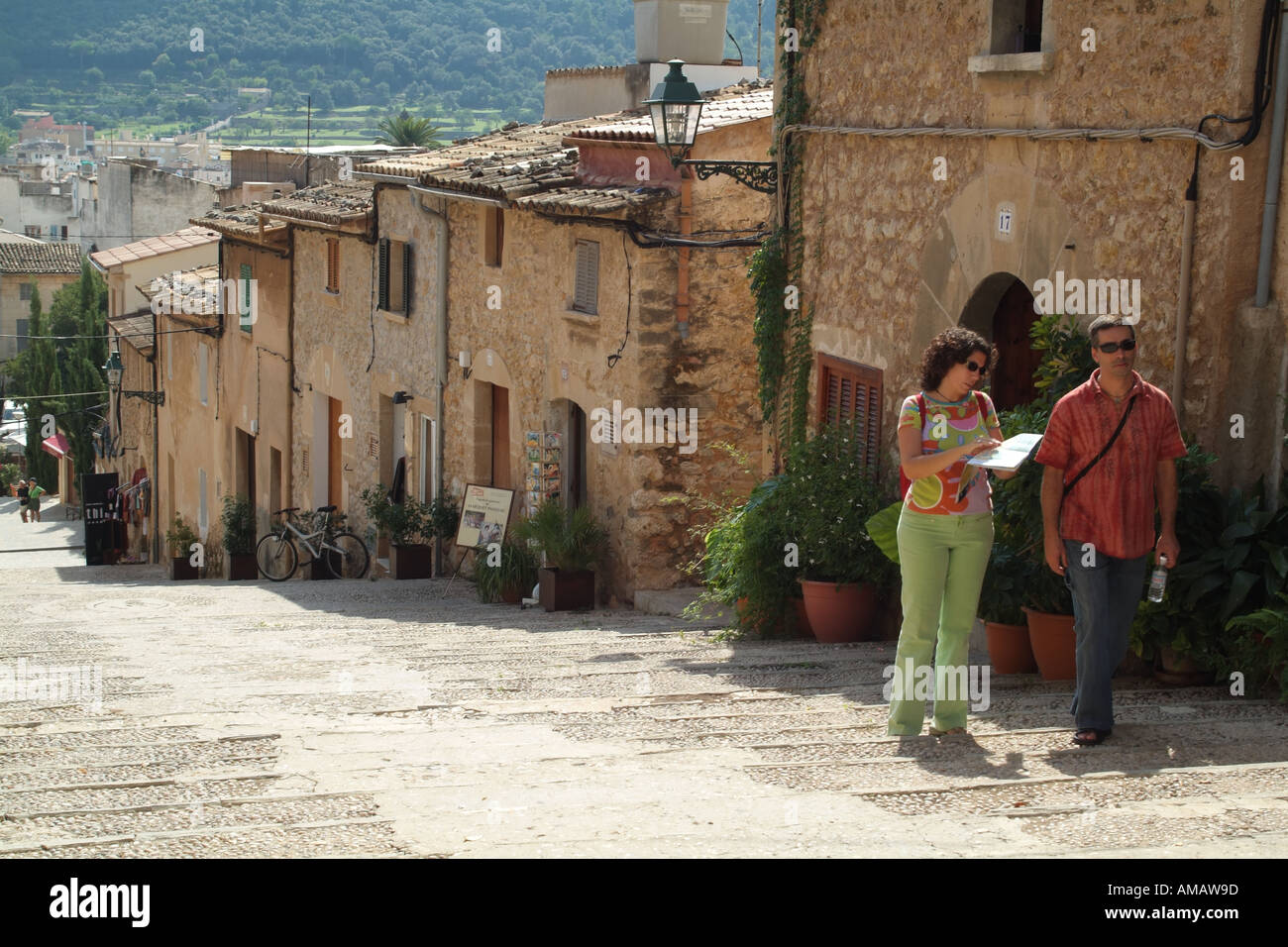 tourists on set of steps Via Crucis Way of the Cross in Pollenca town ...