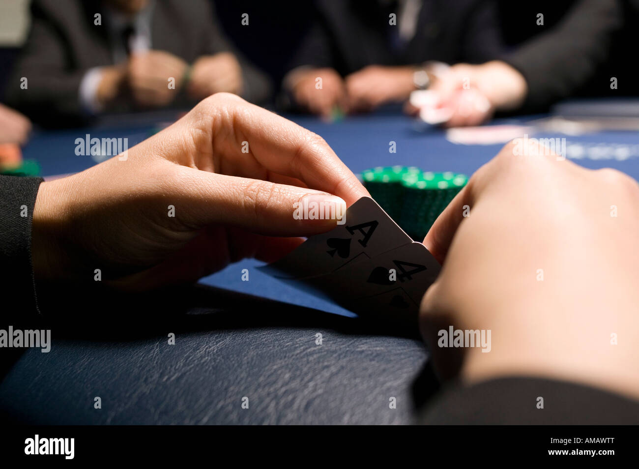Hand holding playing cards Stock Photo - Alamy