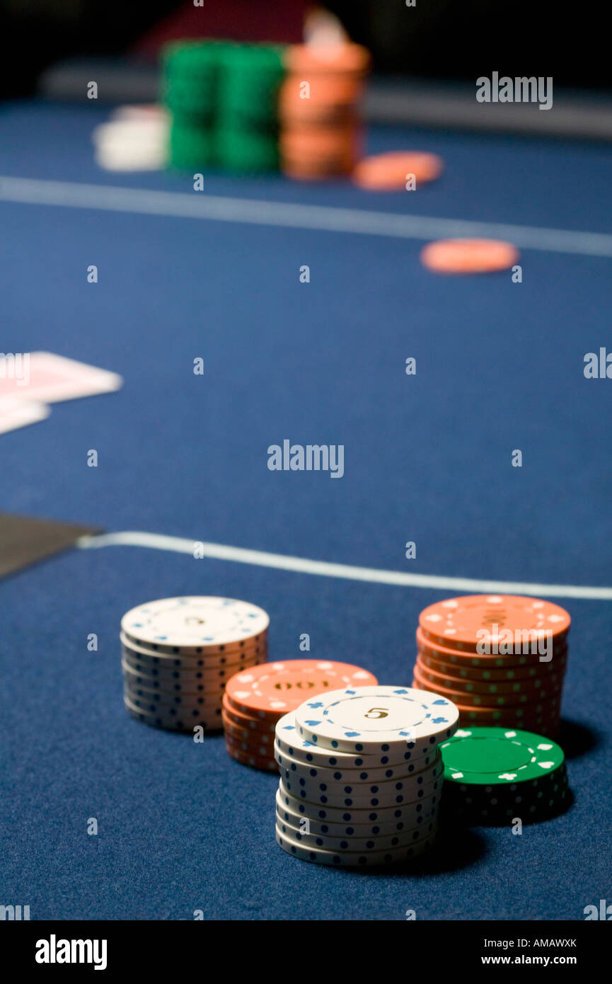 Stack of gambling chips on a casino table Stock Photo - Alamy