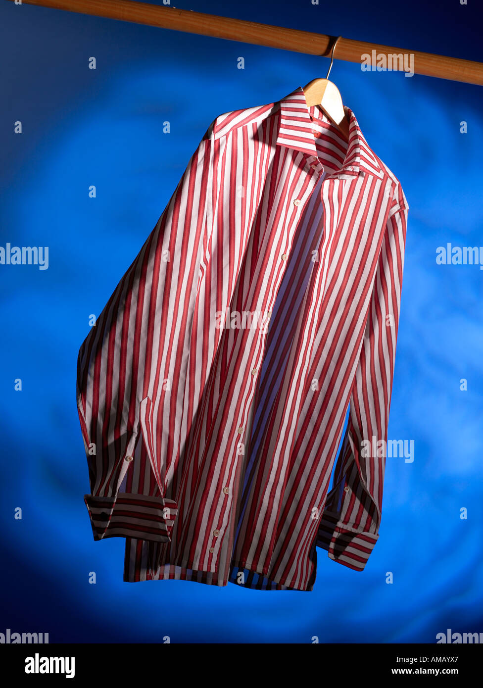 Shirt on Hanger vertical Stock Photo - Alamy