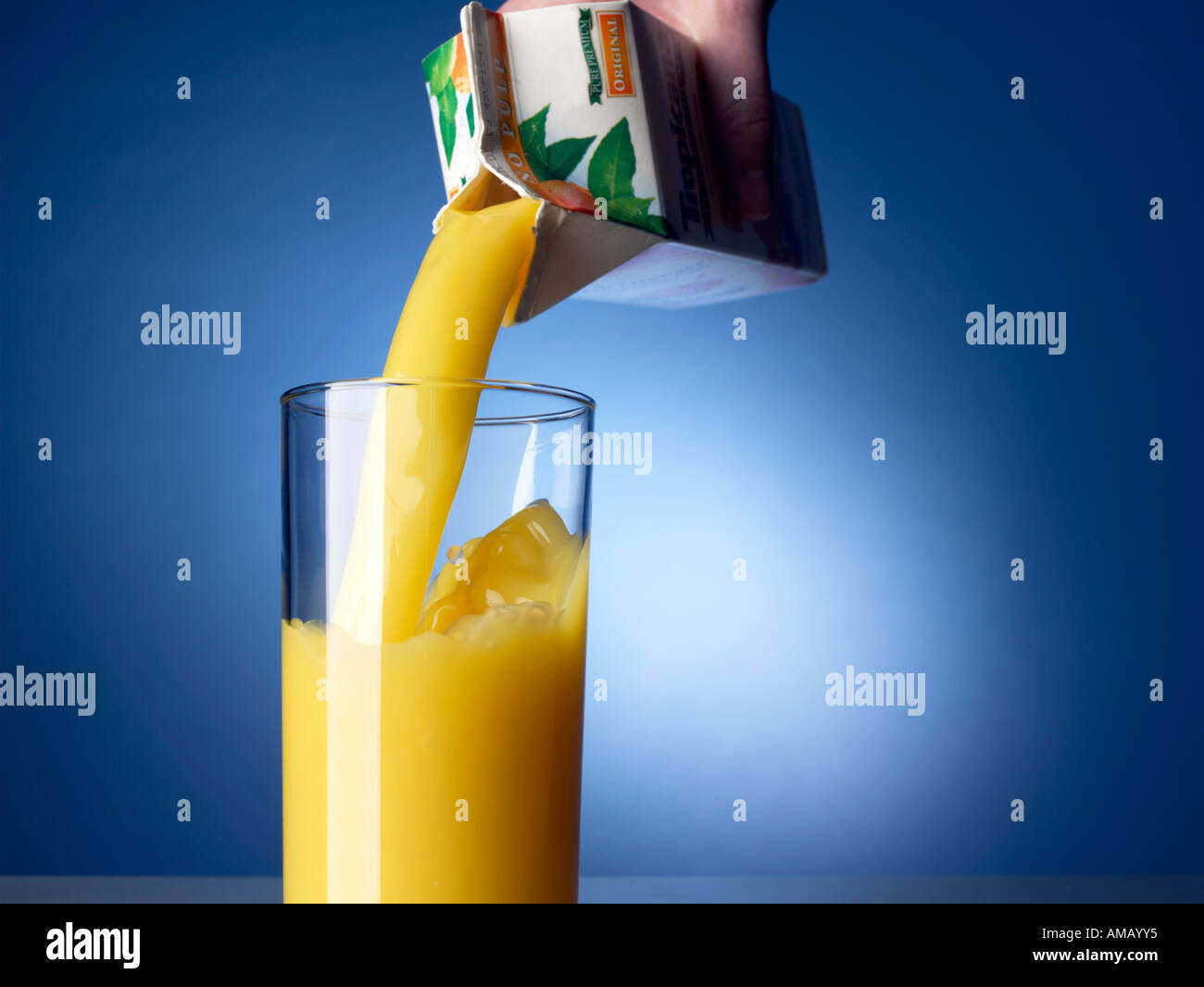 Pouring juice carton hi-res stock photography and images - Alamy