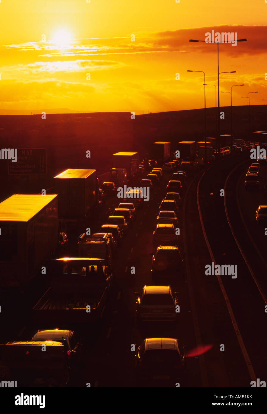traffic jam on the M62 motorway at sunset near Leeds Yorkshire UK Stock ...