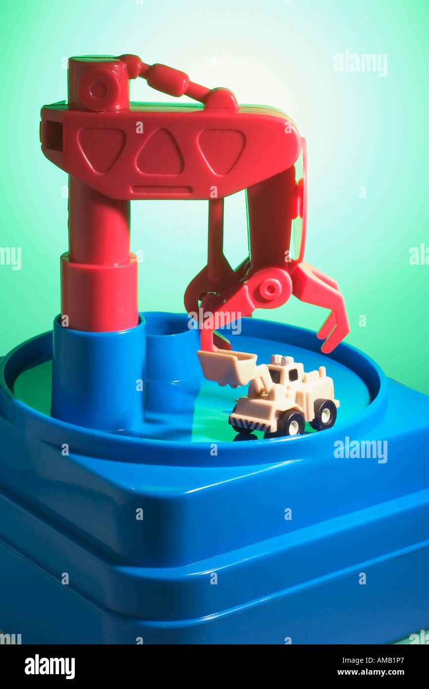 Skill Tester Toy with Miniature Earthmover Stock Photo - Alamy
