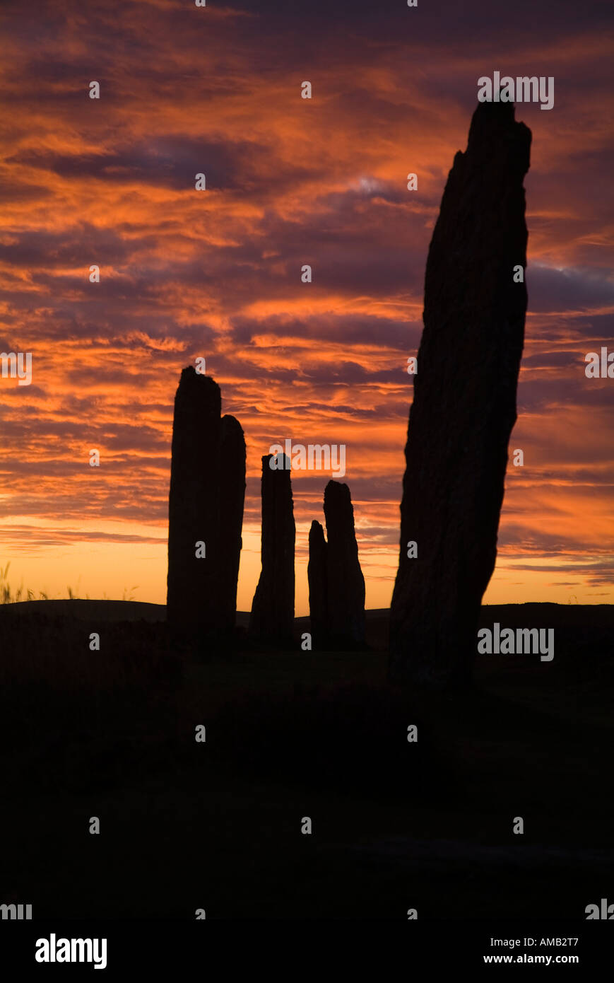 dh Neolithic standing stones RING OF BRODGAR ORKNEY Orange sunset dusk ...