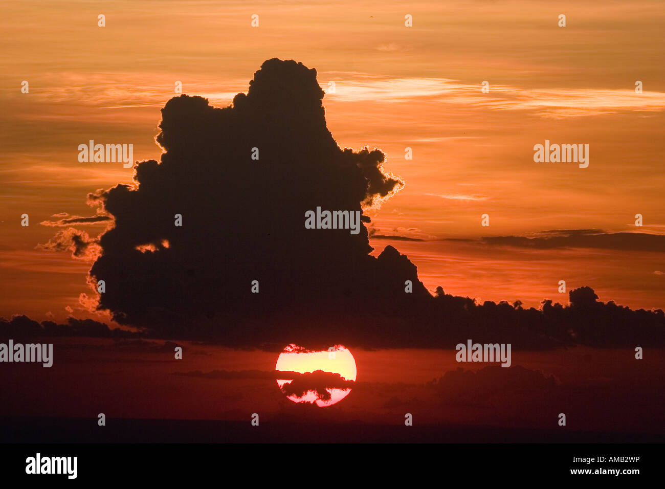 sunset with big cloud Stock Photo - Alamy