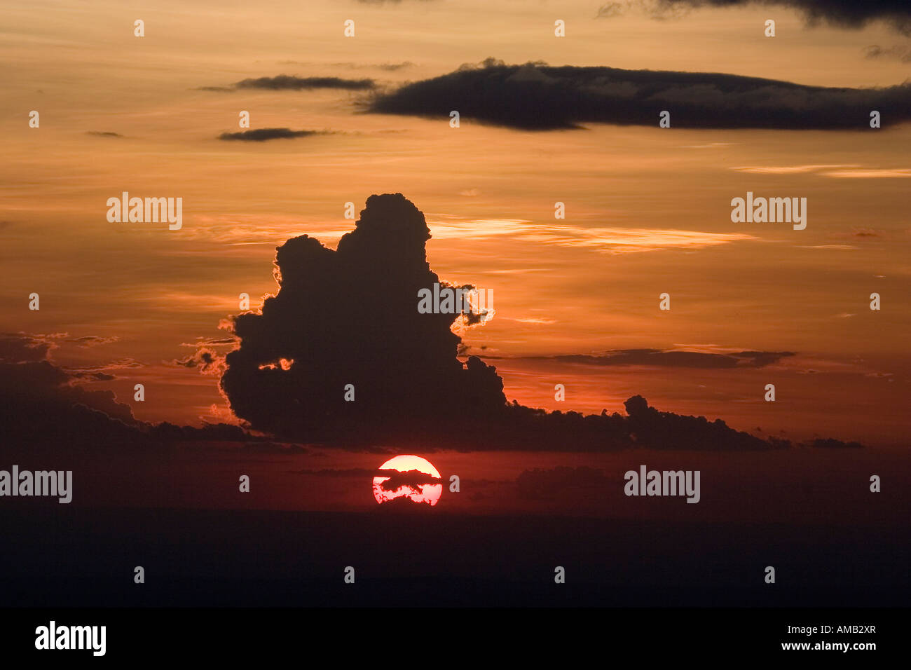 sunset with big cloud Stock Photo - Alamy