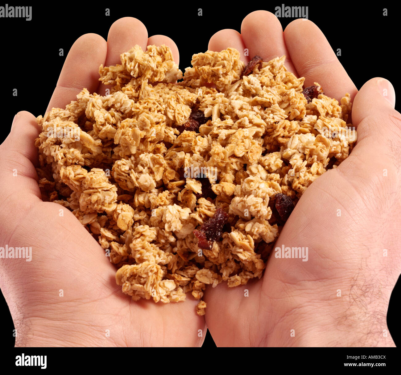 HANDFUL OF GRANOLA Stock Photo - Alamy