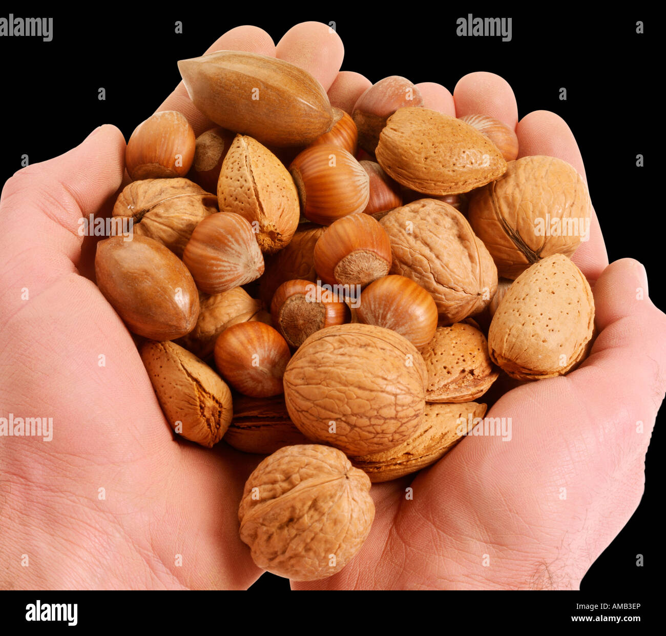 Handful mixed nuts hi-res stock photography and images - Alamy