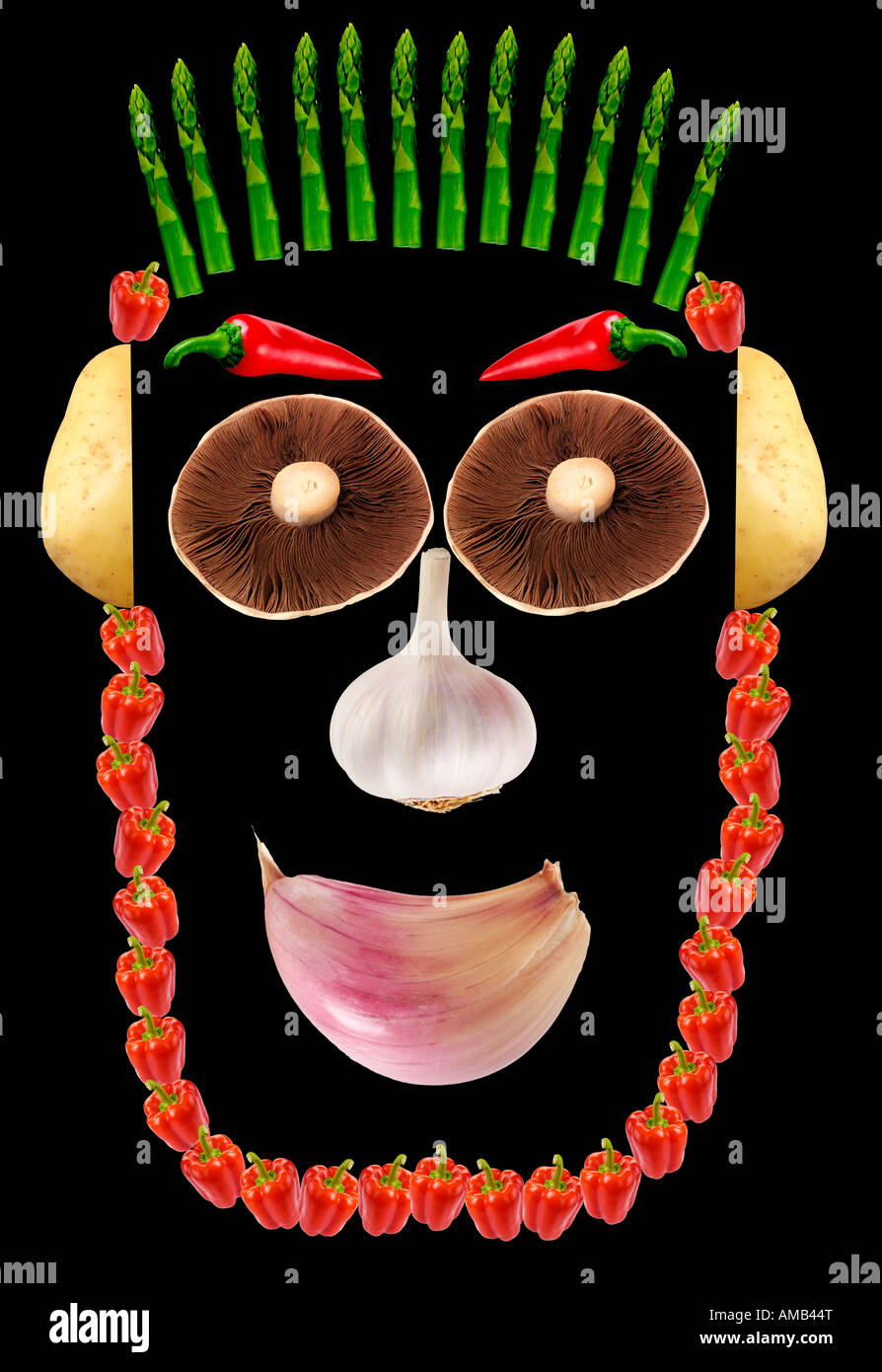 VEGETABLE FACE ON BLACK Stock Photo - Alamy