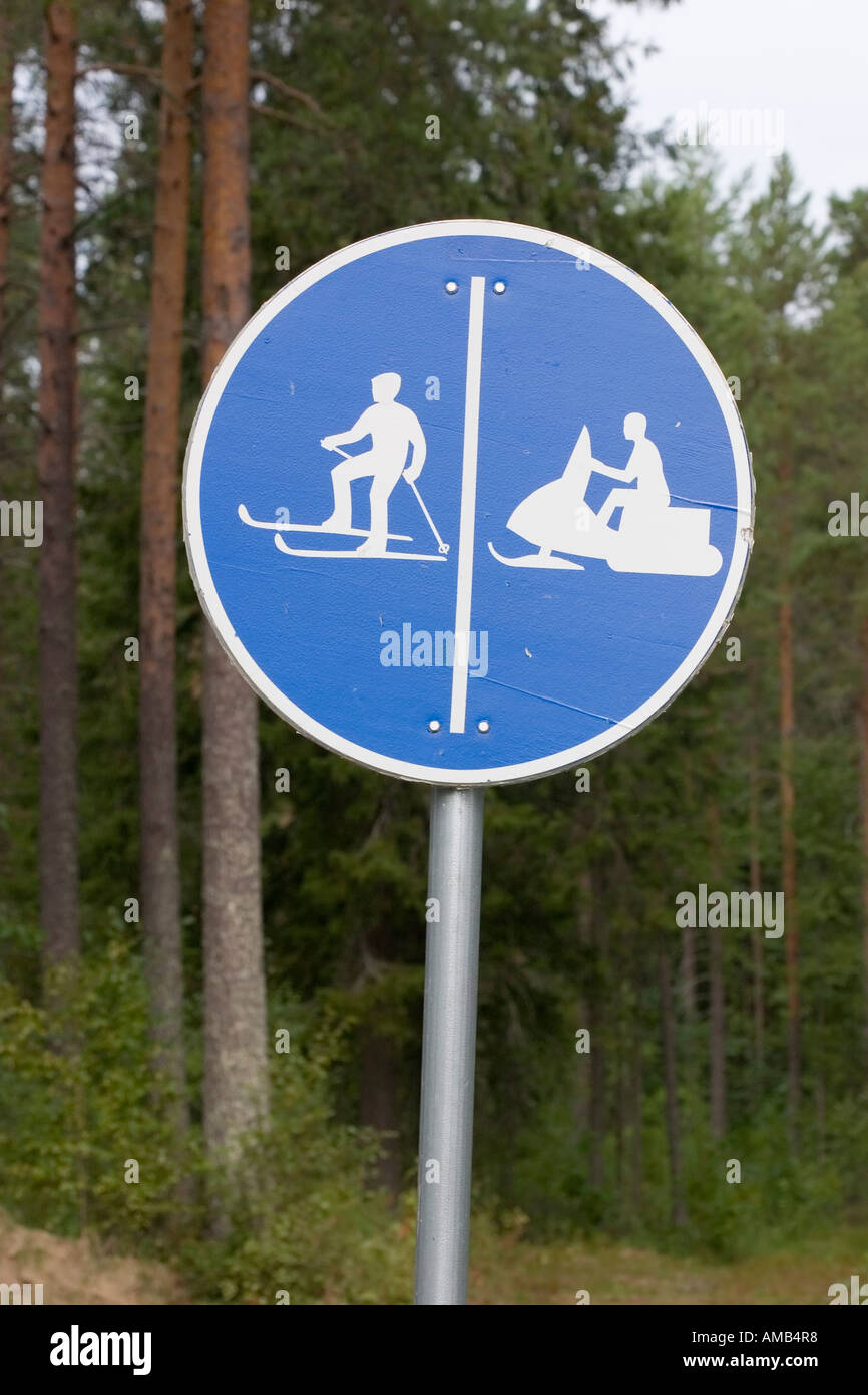 combined skiing and snowmobile route traffic sign Stock Photo - Alamy
