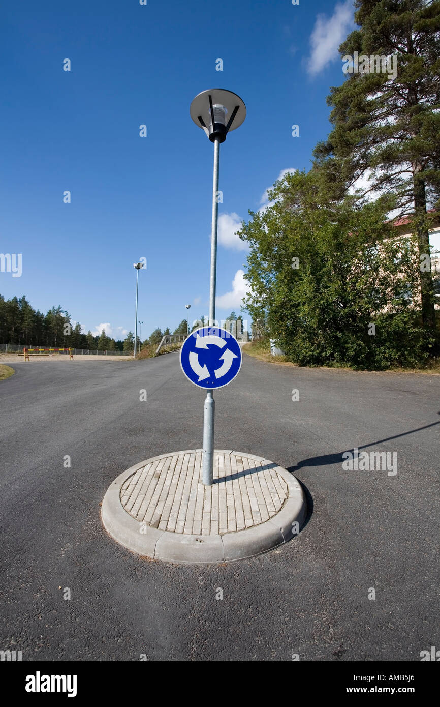Compulsory roundabout traffic sign hi-res stock photography and images ...