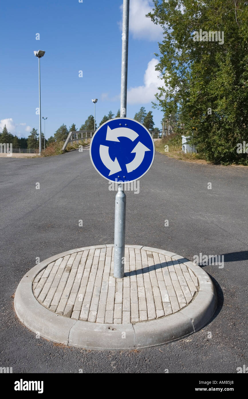 compulsory roundabout traffic sign Stock Photo - Alamy