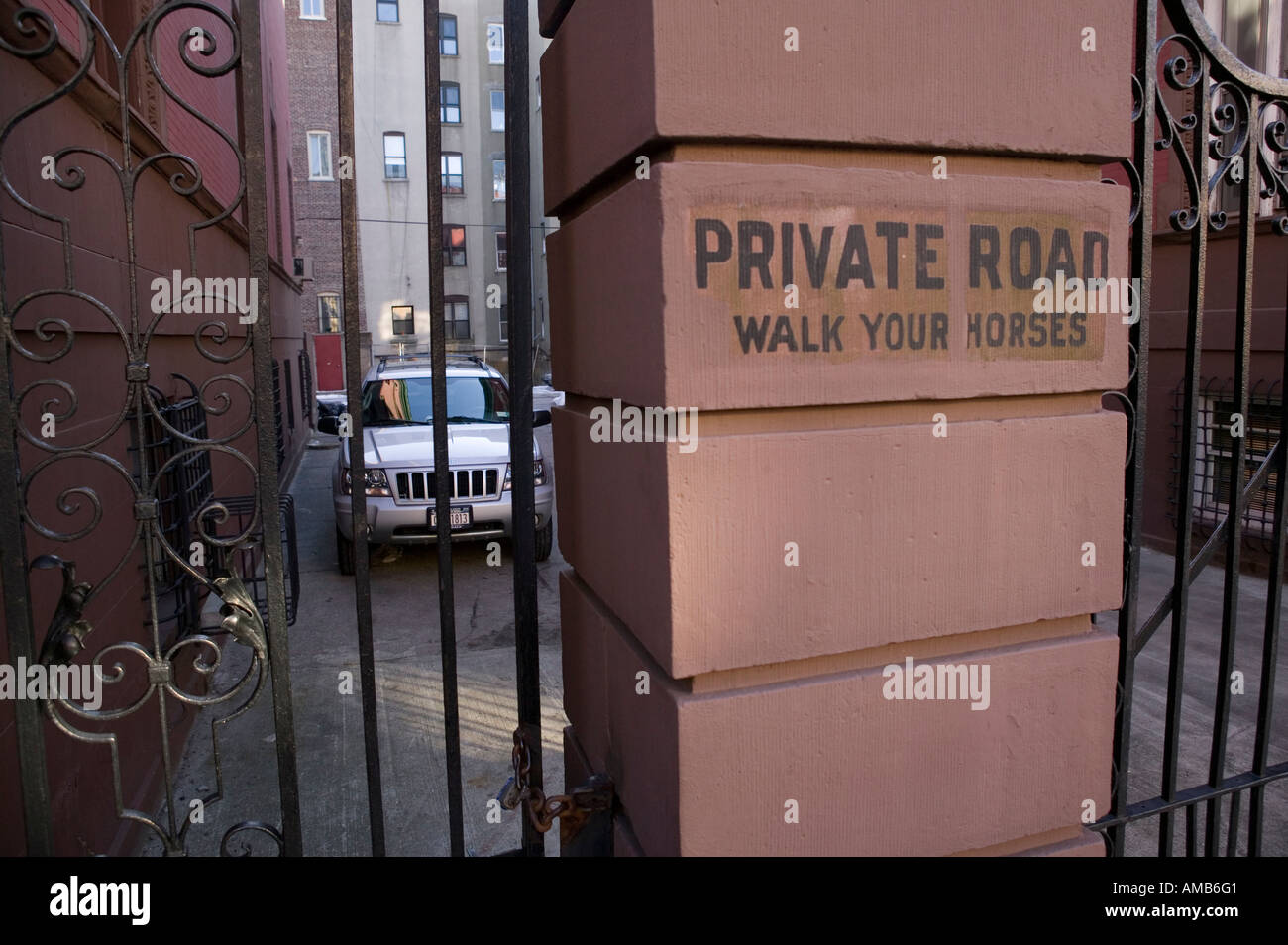 Closed gate across access to back alley to Strivers Row in Harlem New ...