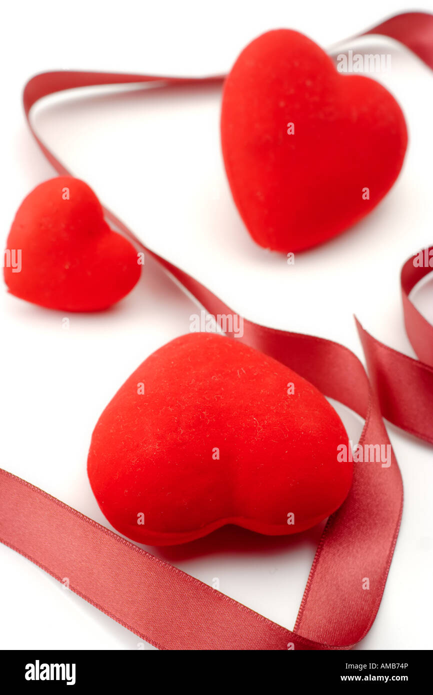 Three red hearts and a red stripe Stock Photo - Alamy