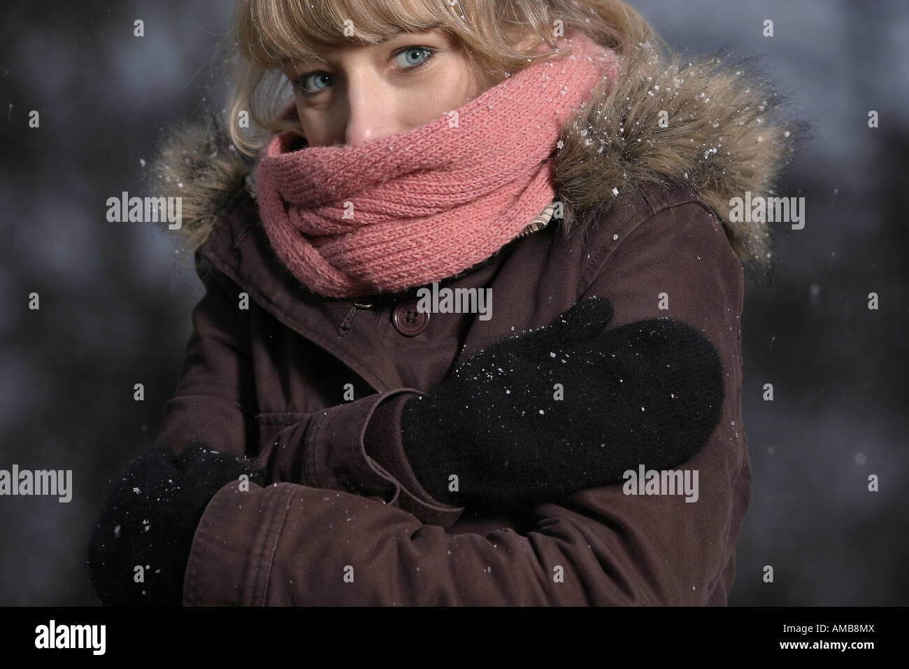 Shivering cute woman winter clothes hi-res stock photography and images ...