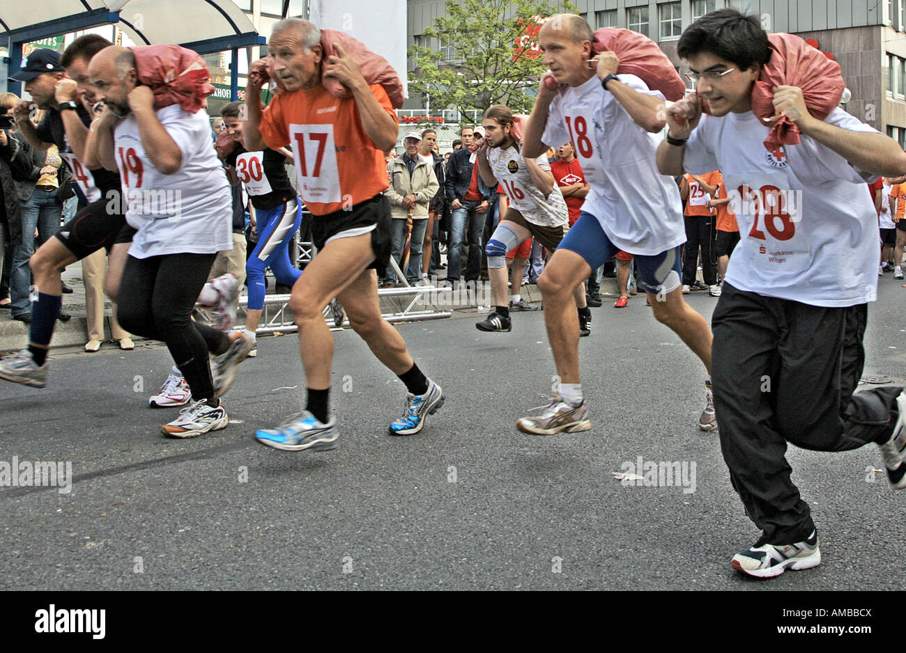 the traditional onion sack carrying relay during the funfair, Germany ...