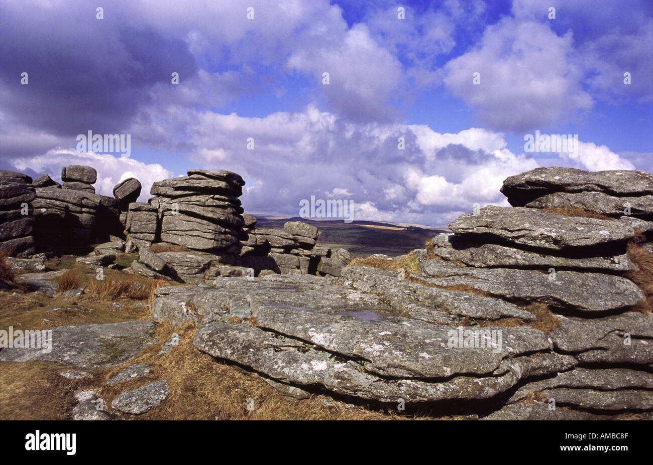 Combestone Tor with interesting cloud formation Stock Photo - Alamy
