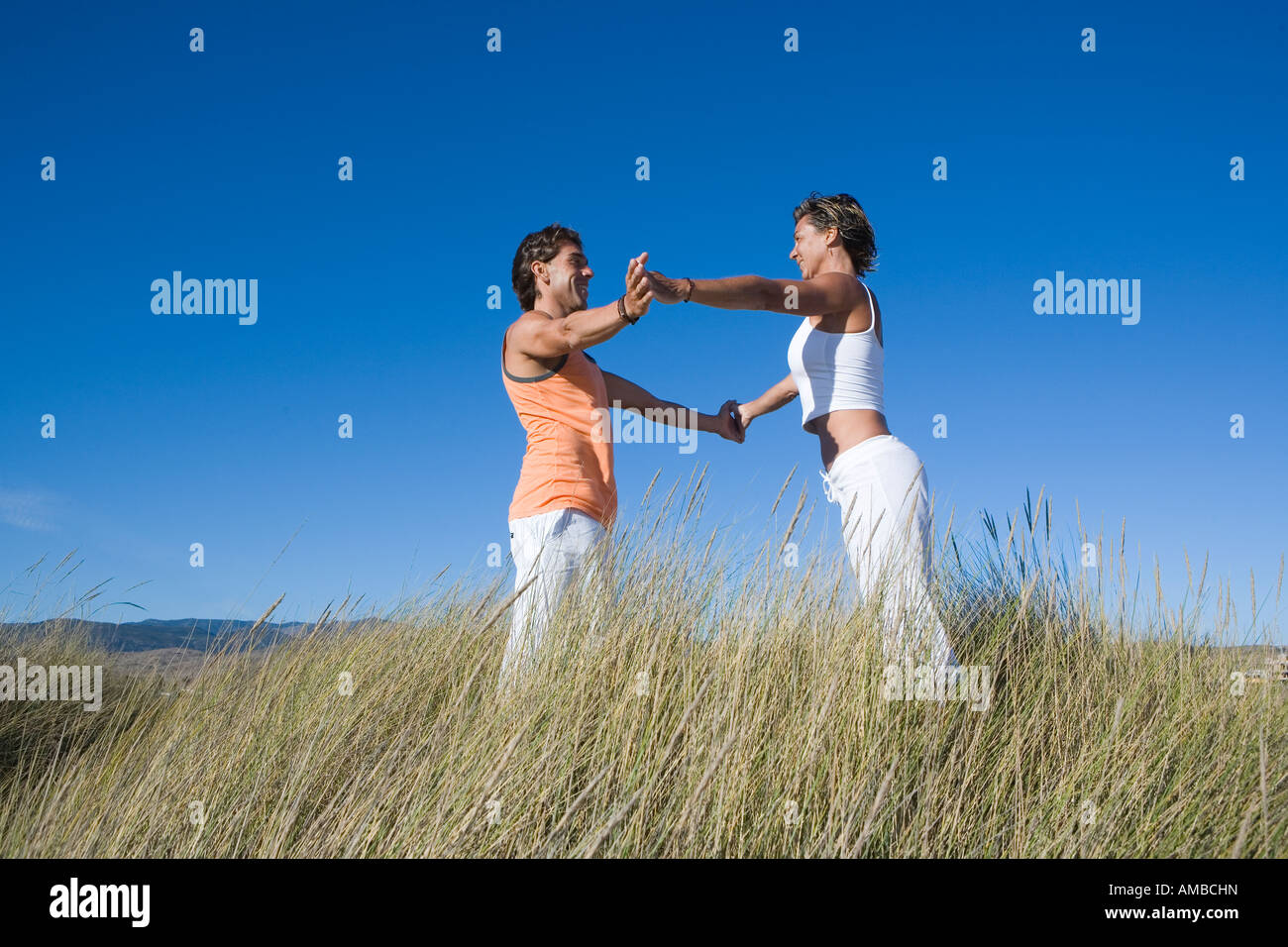couple in nature holding hands Stock Photo - Alamy