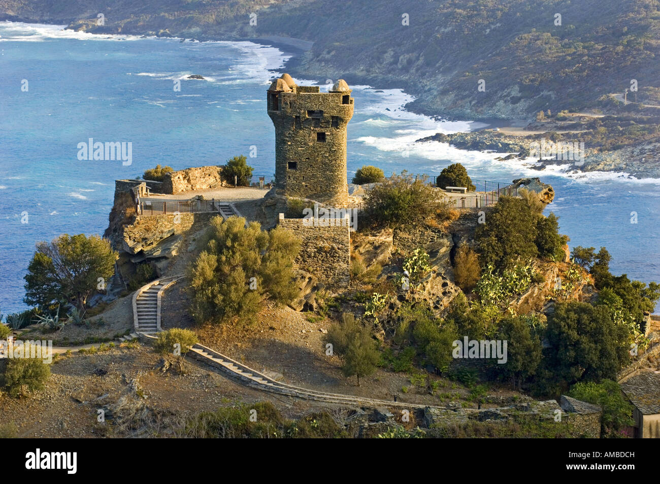 typical Genoese tower in village of Nonza, France, Corsica Stock Photo ...