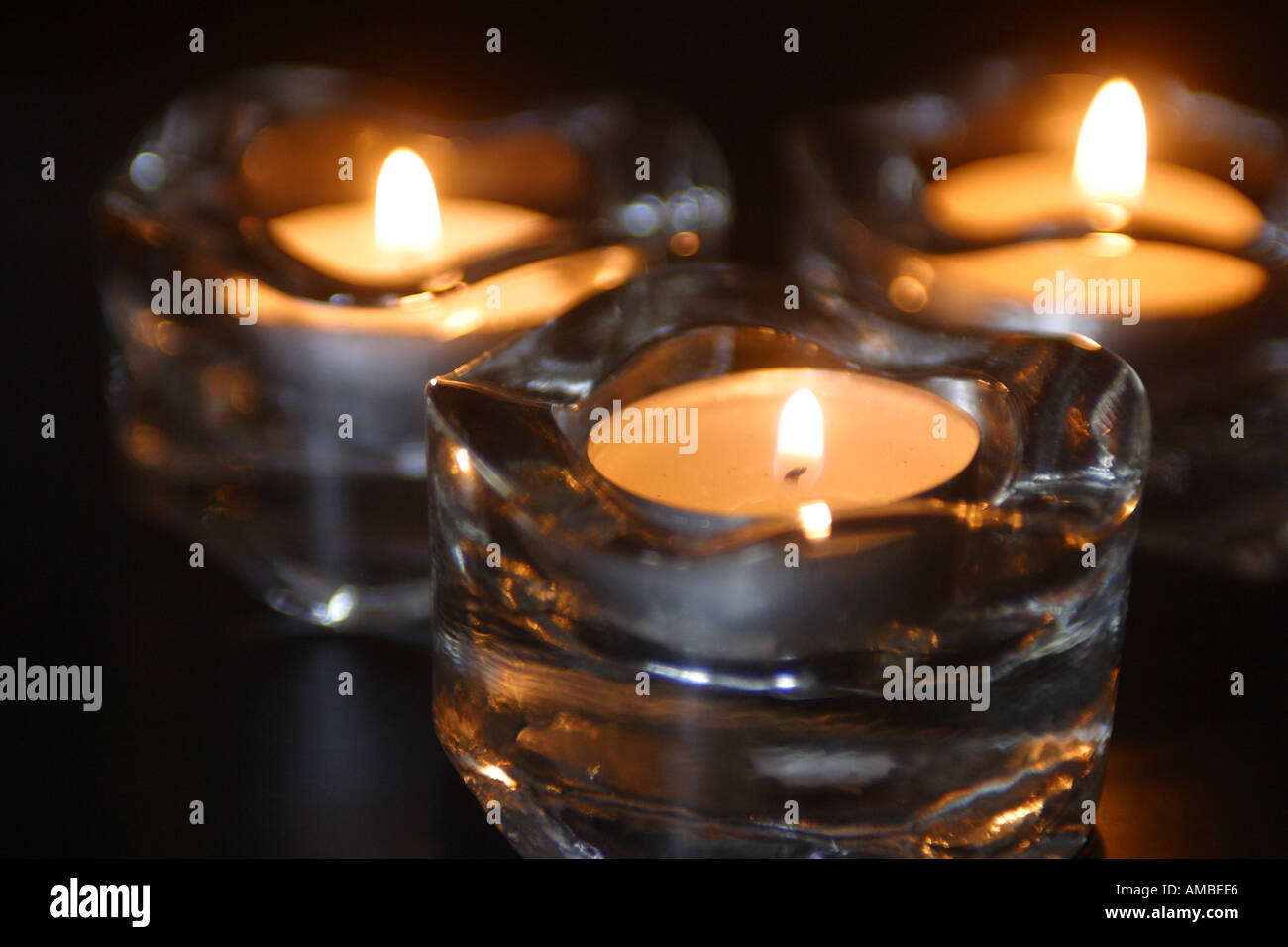three candles tree light tea lights Stock Photo - Alamy