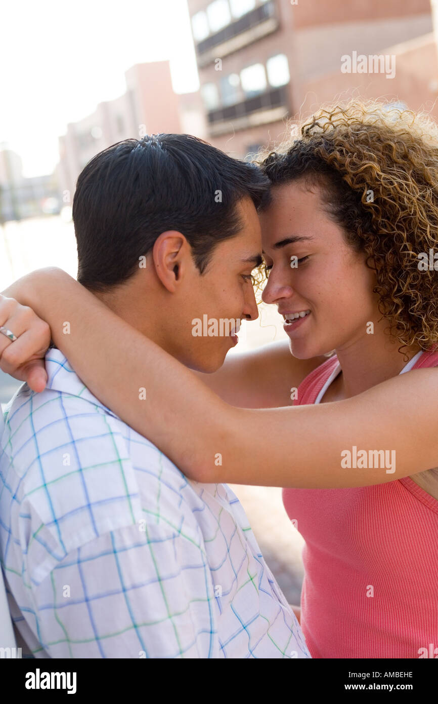 Young woman arms wrapped around hi-res stock photography and images - Alamy