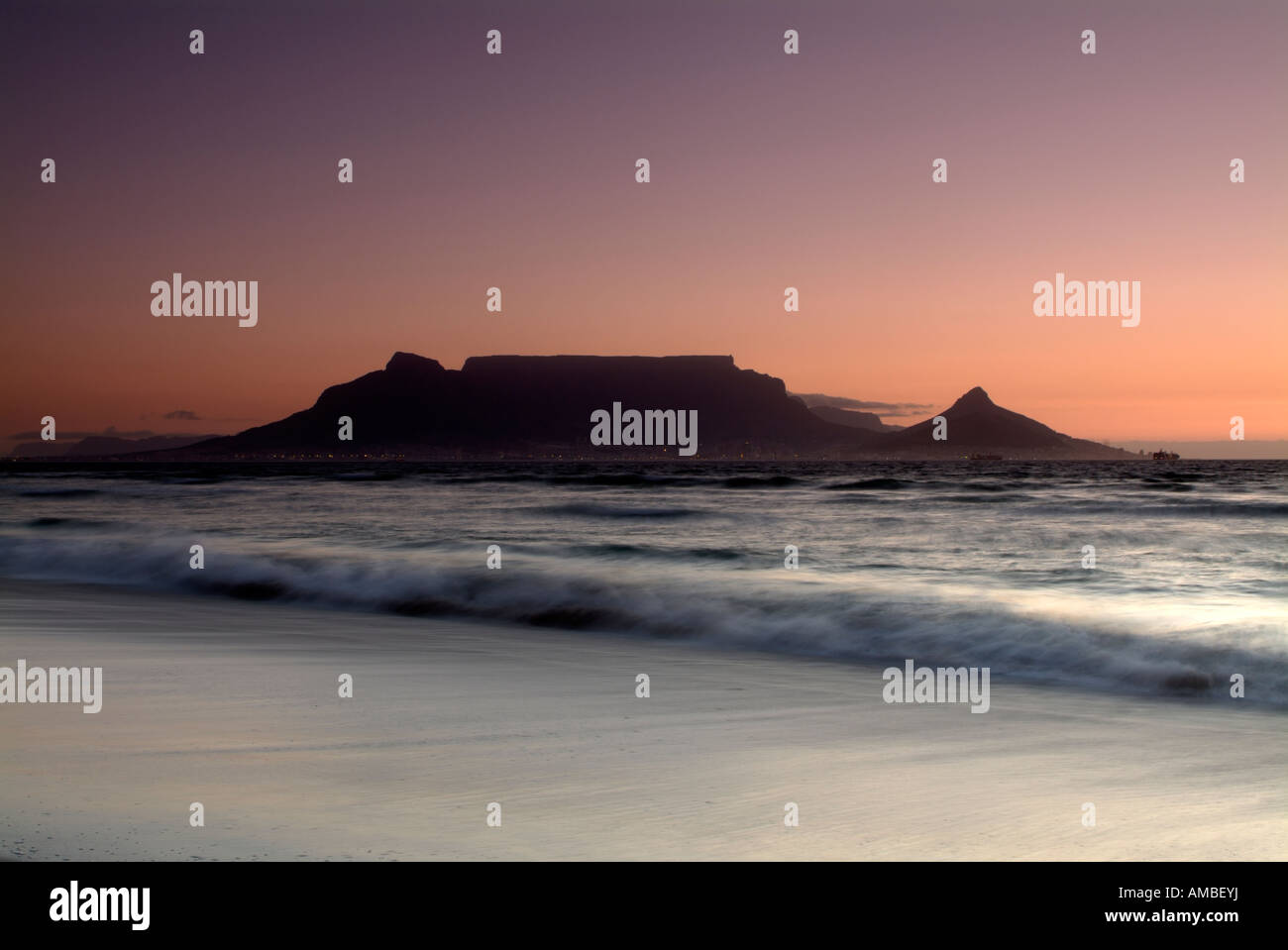 Table Mountain silhouetted during a glorious and dramatic sunset viewed ...