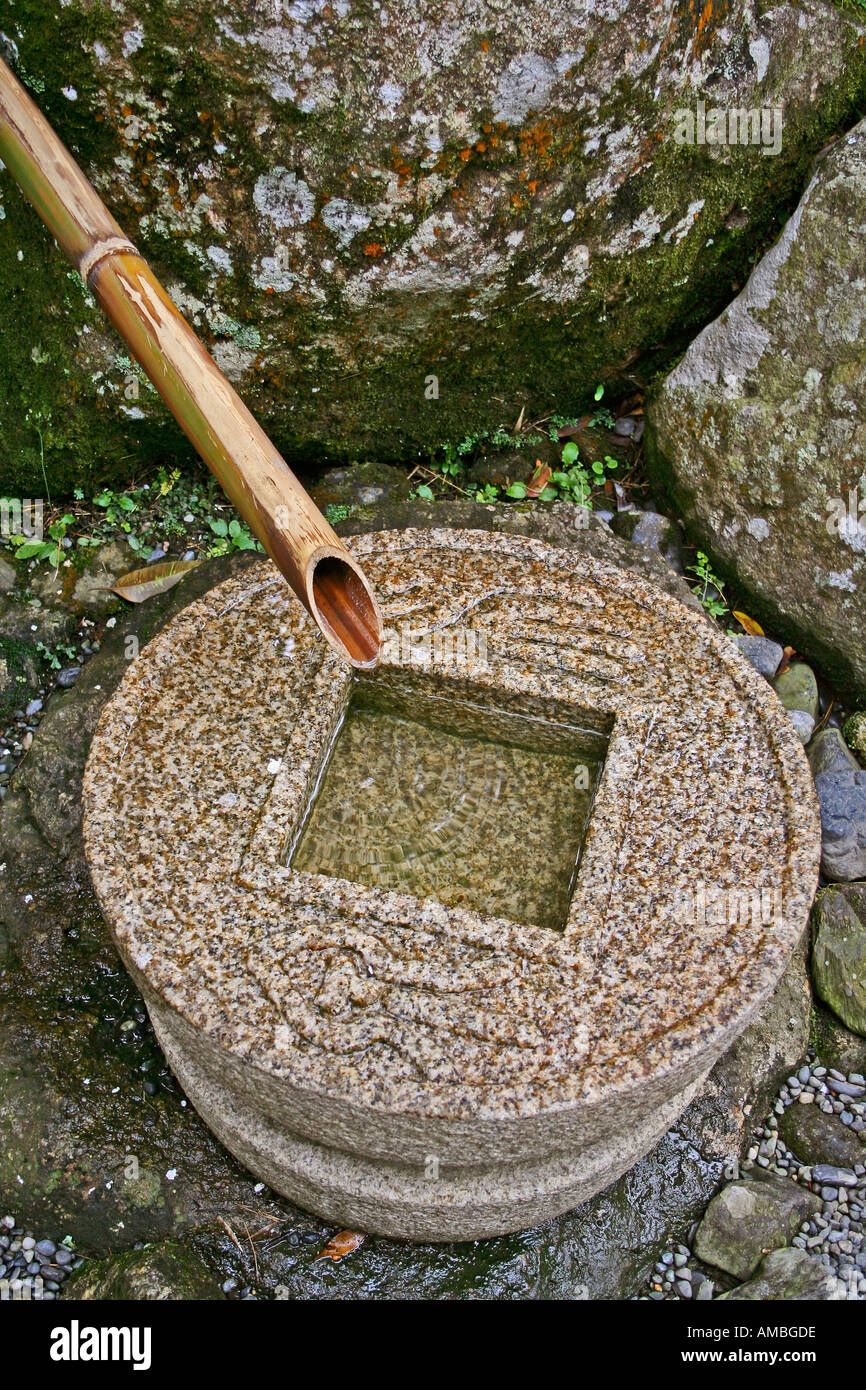 Japanese garden water stone feature Stock Photo - Alamy