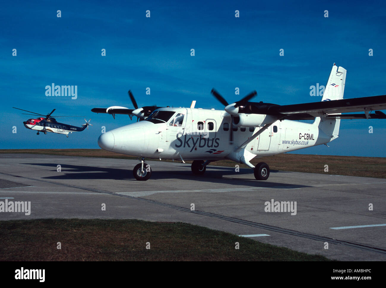 isle of scilly aircraft landing at airport bringing holidaymakers to ...