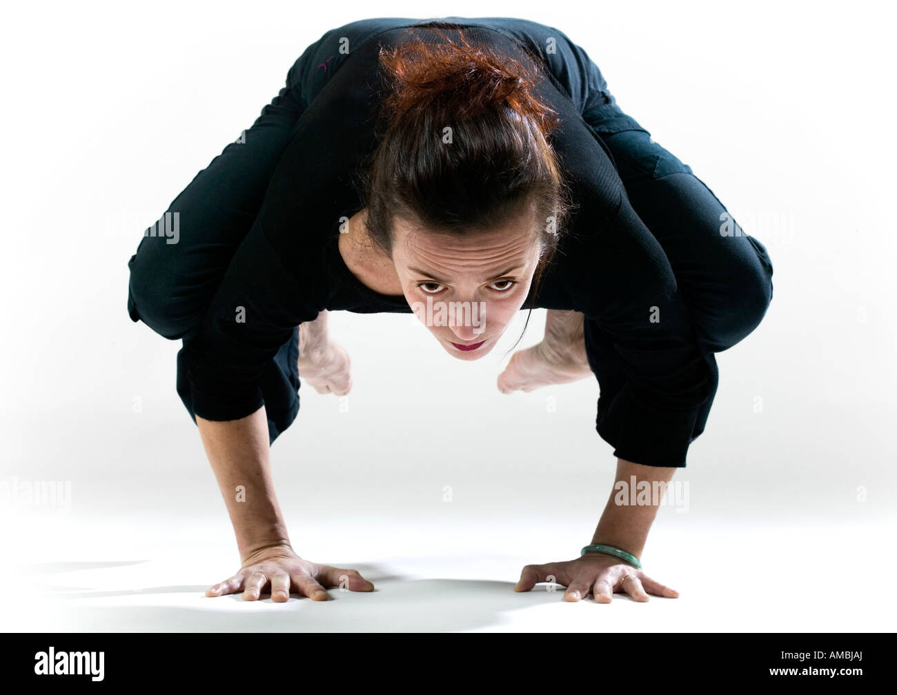 Bakasana frontal forehead face hi-res stock photography and images - Alamy