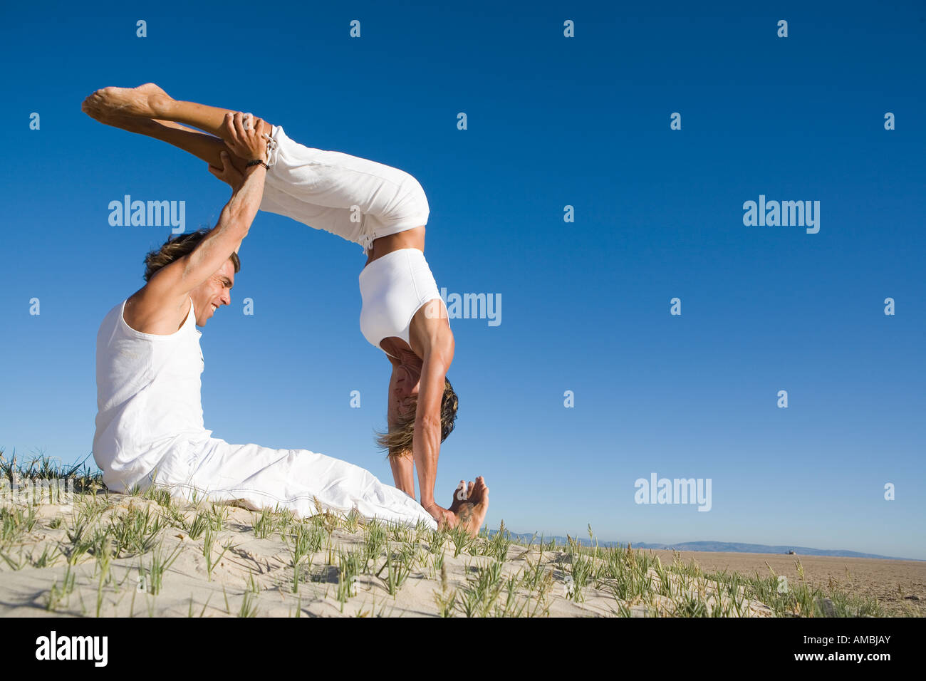 Passionate couple on beach hi-res stock photography and images - Alamy