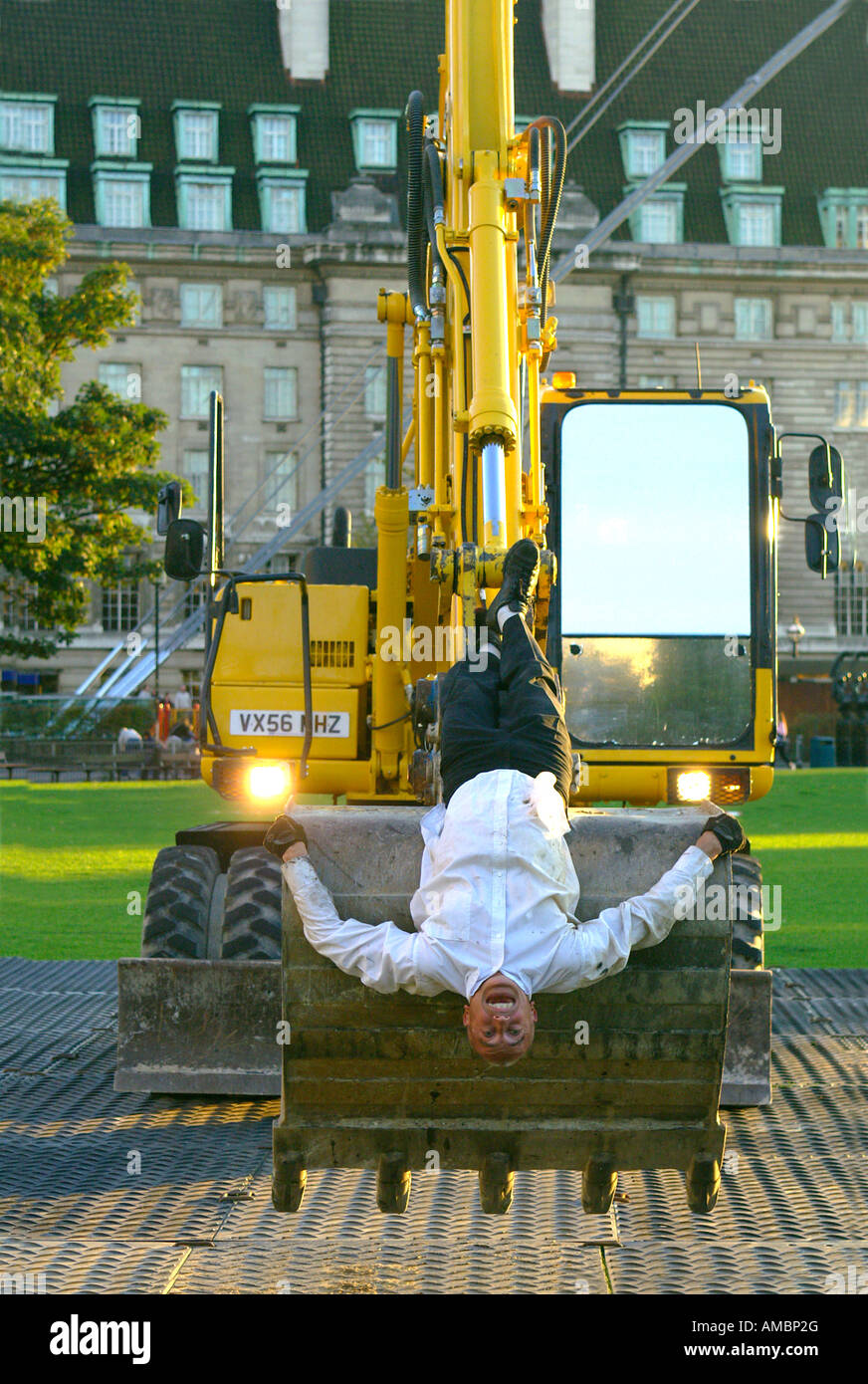 dance with excavator in london Stock Photo - Alamy