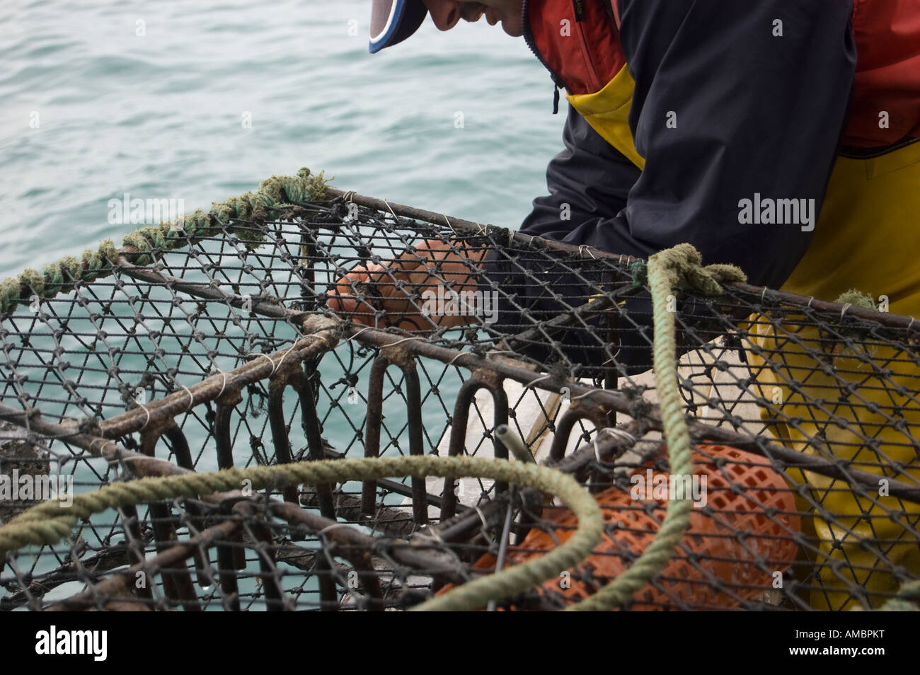 Crayfisherman Robert Mcherron mending a craypot, Vessel Mystique ...