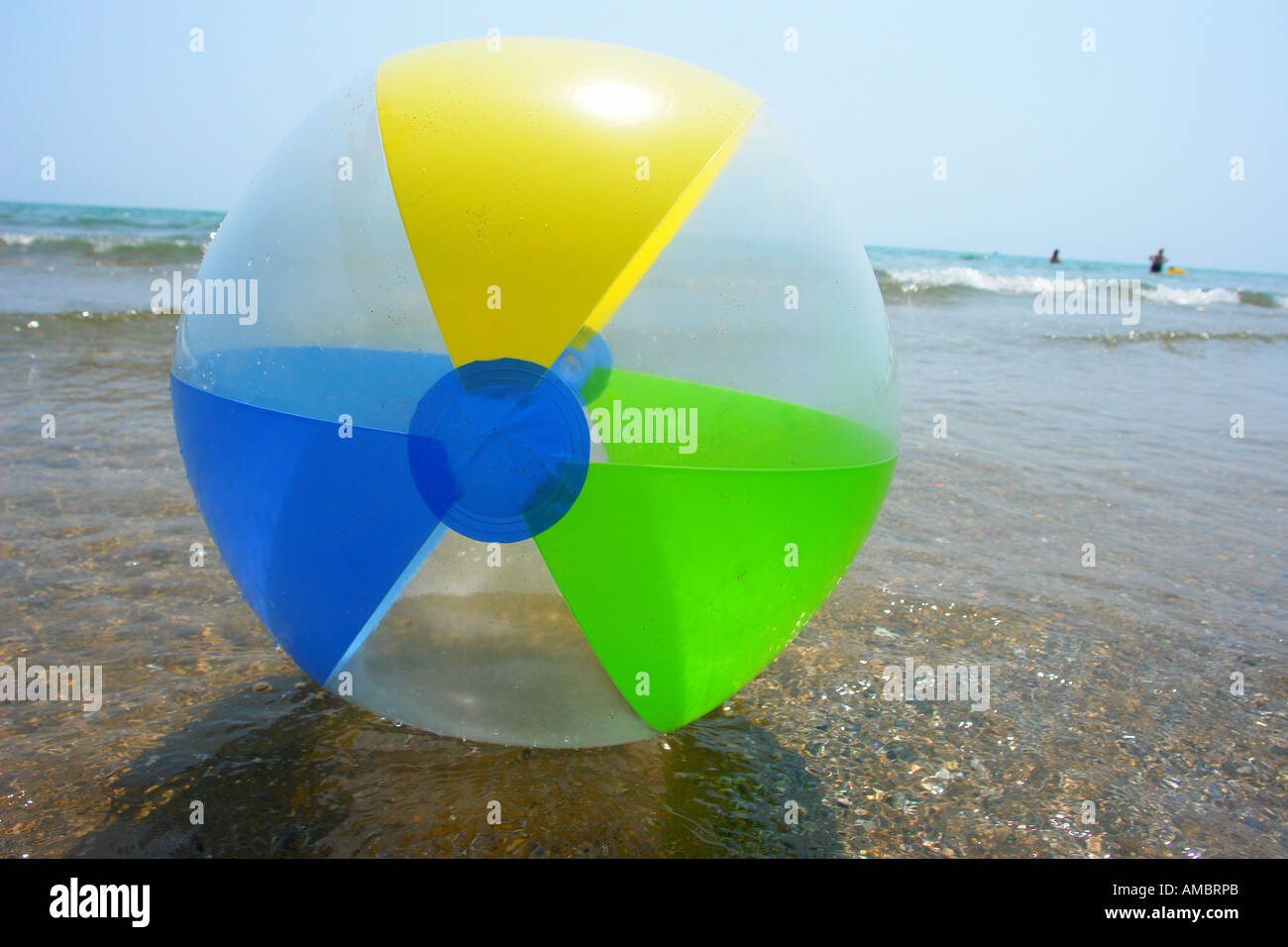 Beach ball at the ocean Stock Photo - Alamy