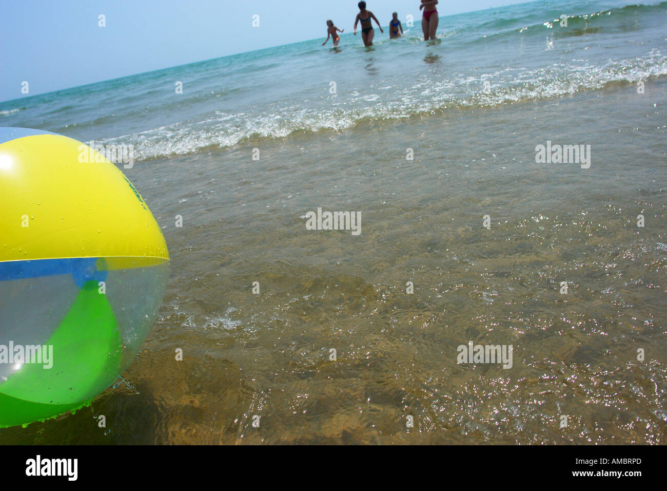 Beach ball at the ocean Stock Photo - Alamy