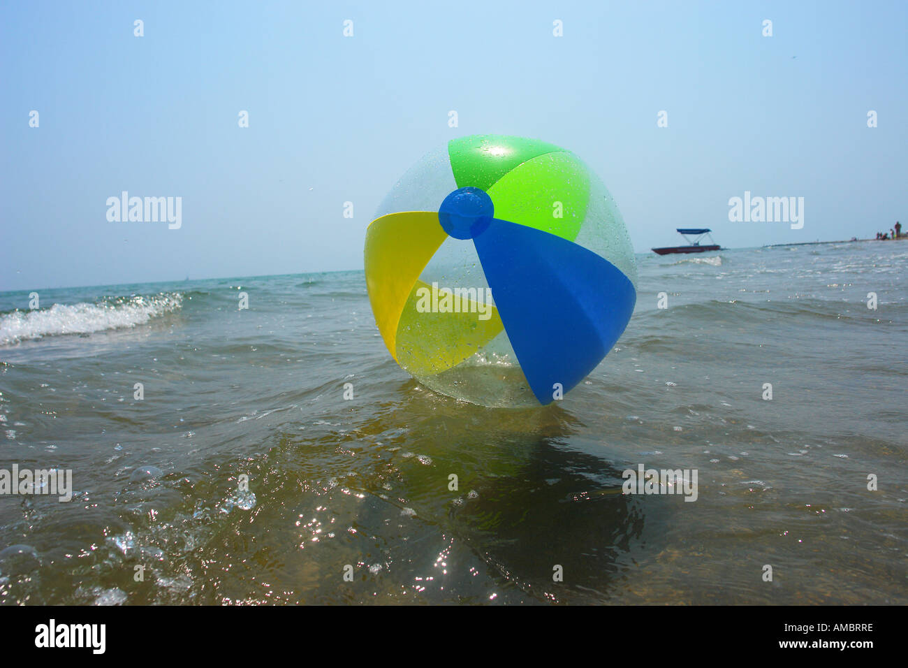 Beach ball at the ocean Stock Photo - Alamy