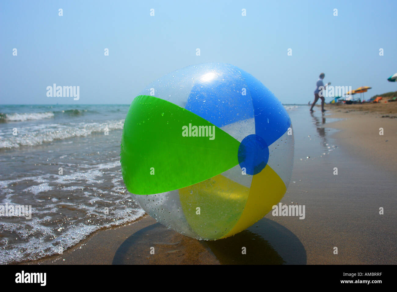 Beach ball at the ocean Stock Photo - Alamy