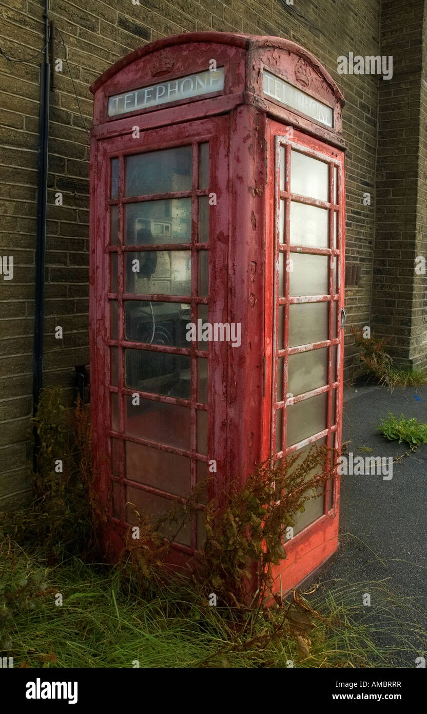 Disused red telephone box Stock Photo - Alamy