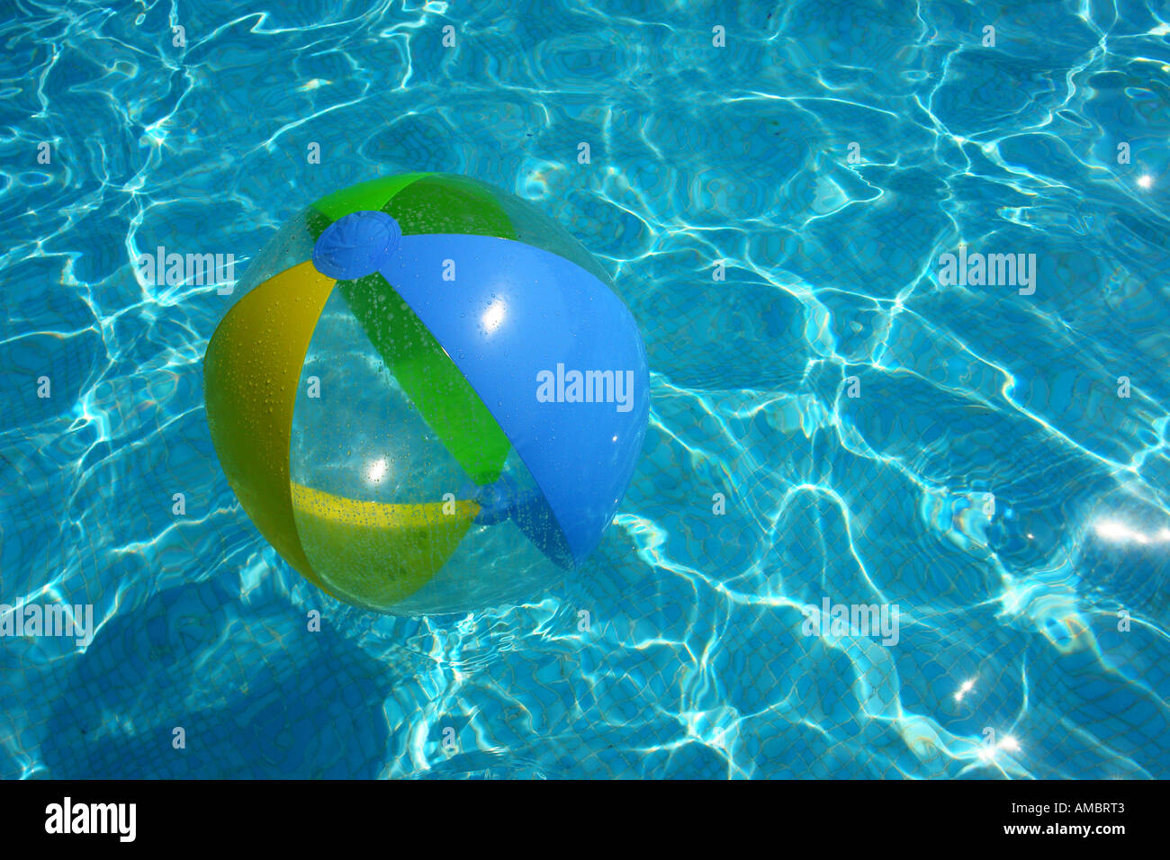beach ball in the pool Stock Photo - Alamy