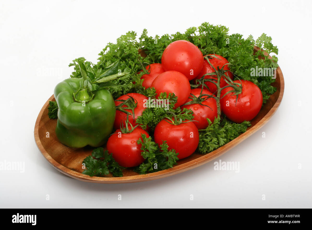 Ripe red cherry tomatoes on the stems vegetables overhead top view close up horizontal isolated ...